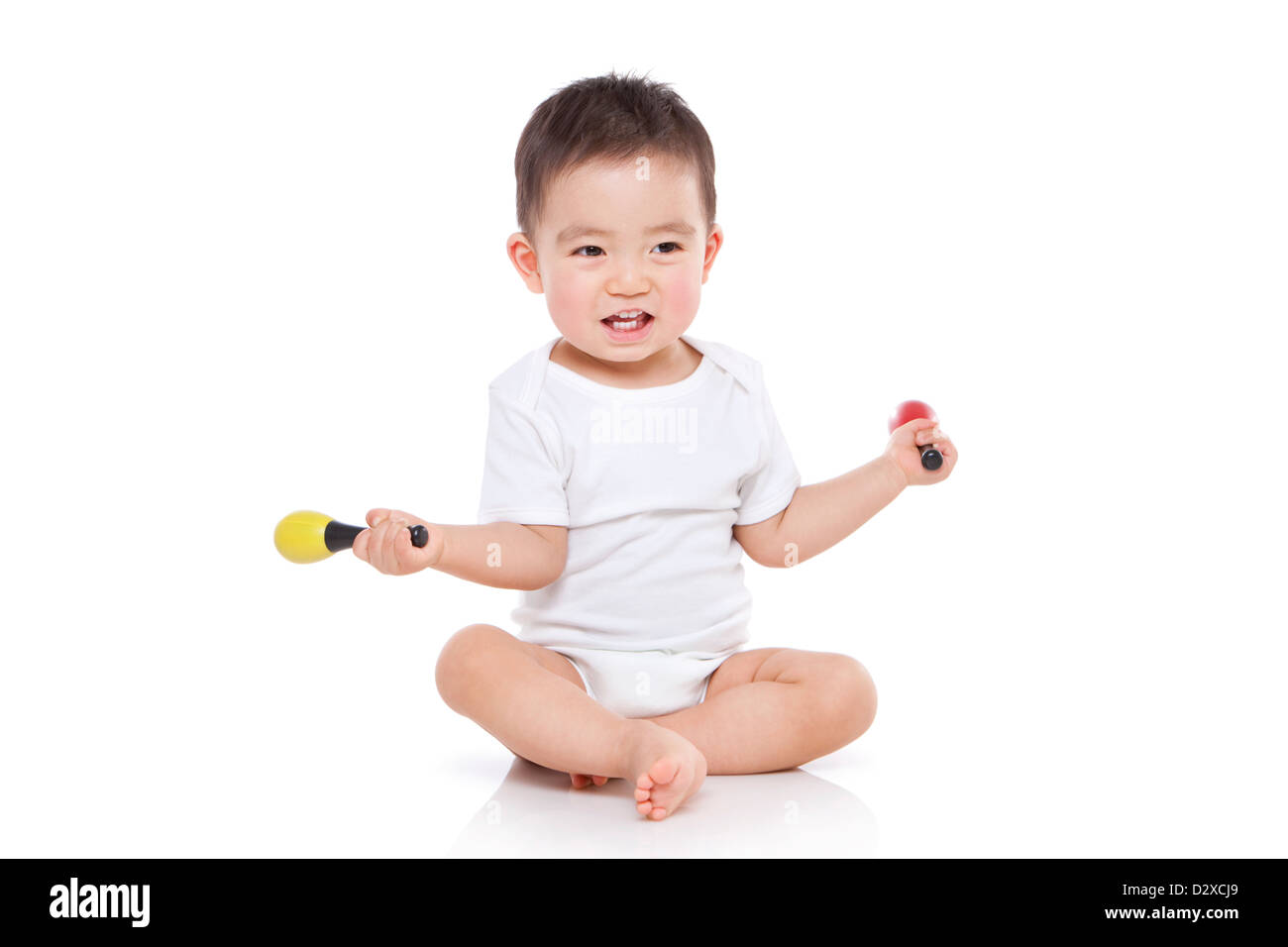 Happy baby boy with toy microphone Stock Photo - Alamy