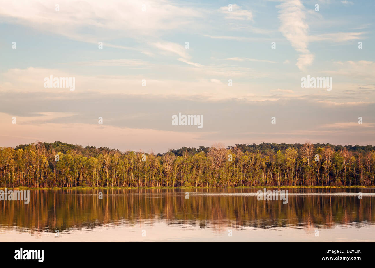 A beautiful sunrise over a lake Stock Photo - Alamy