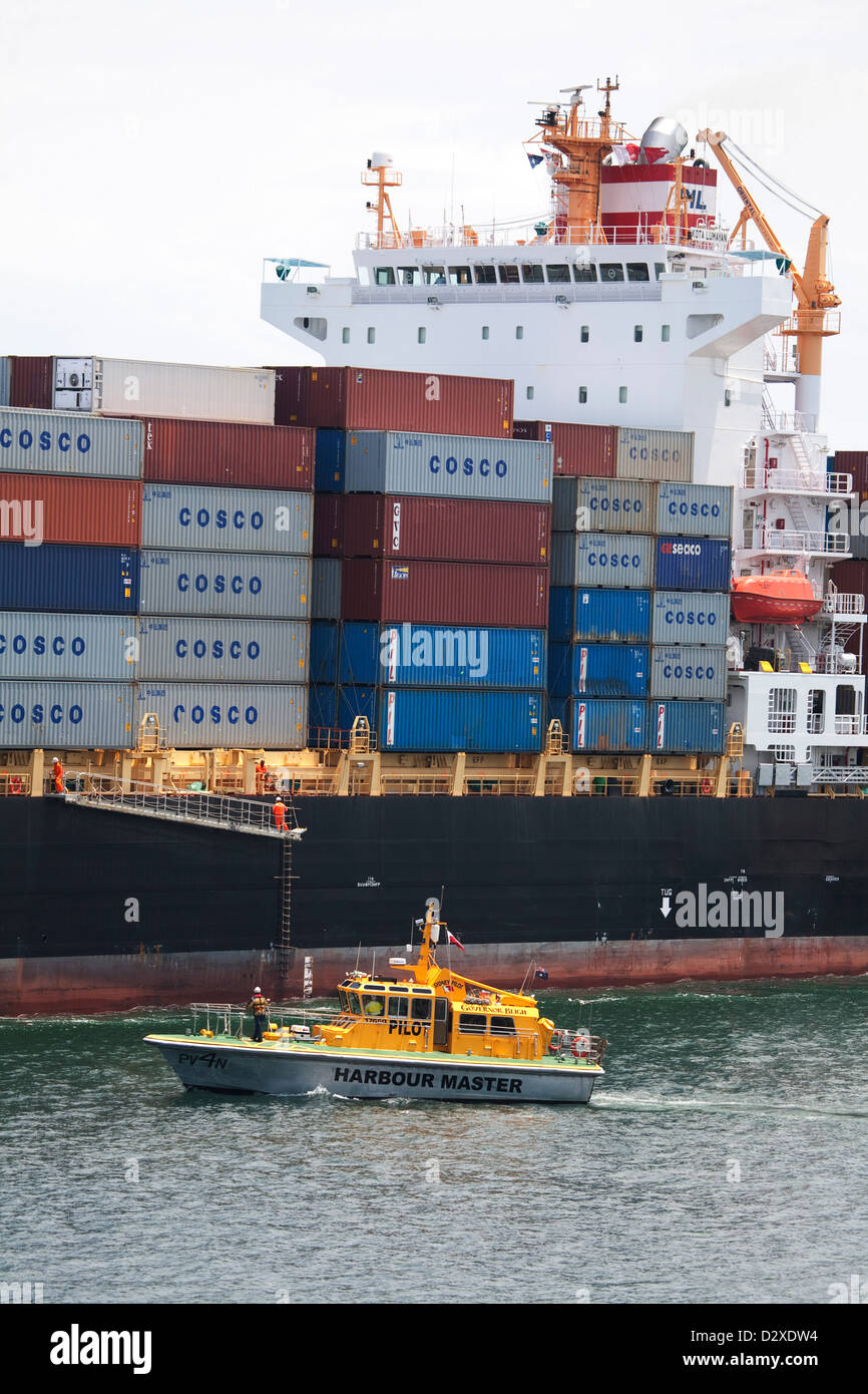 Pilot vessel alongside the Singapore owned Kota Lumayan Container Ship ...