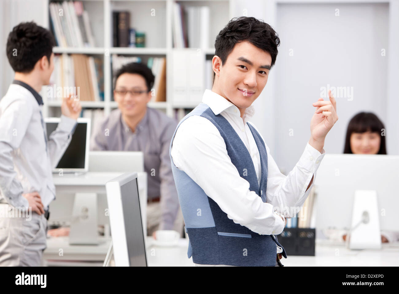Cheerful business colleagues at work in the office Stock Photo - Alamy