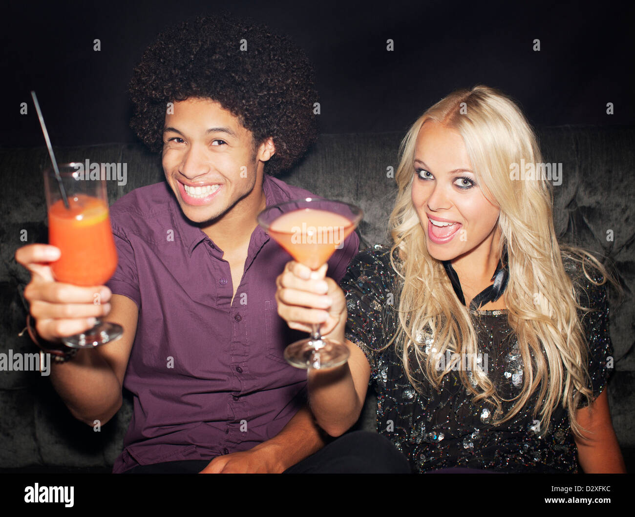 Couple couch cocktails hi-res stock photography and images - Alamy