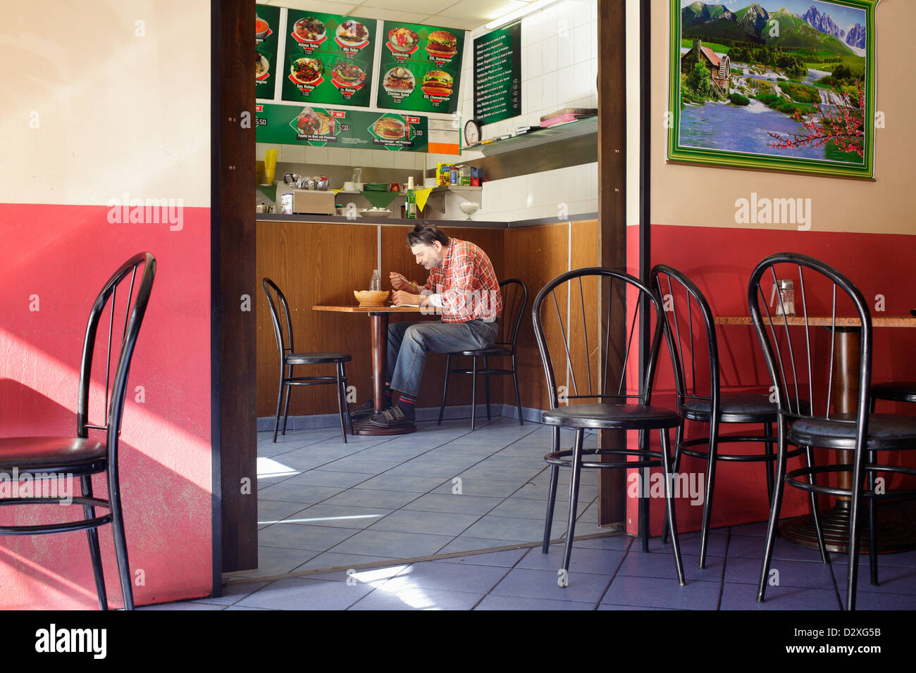 Hunched over hi-res stock photography and images - Alamy