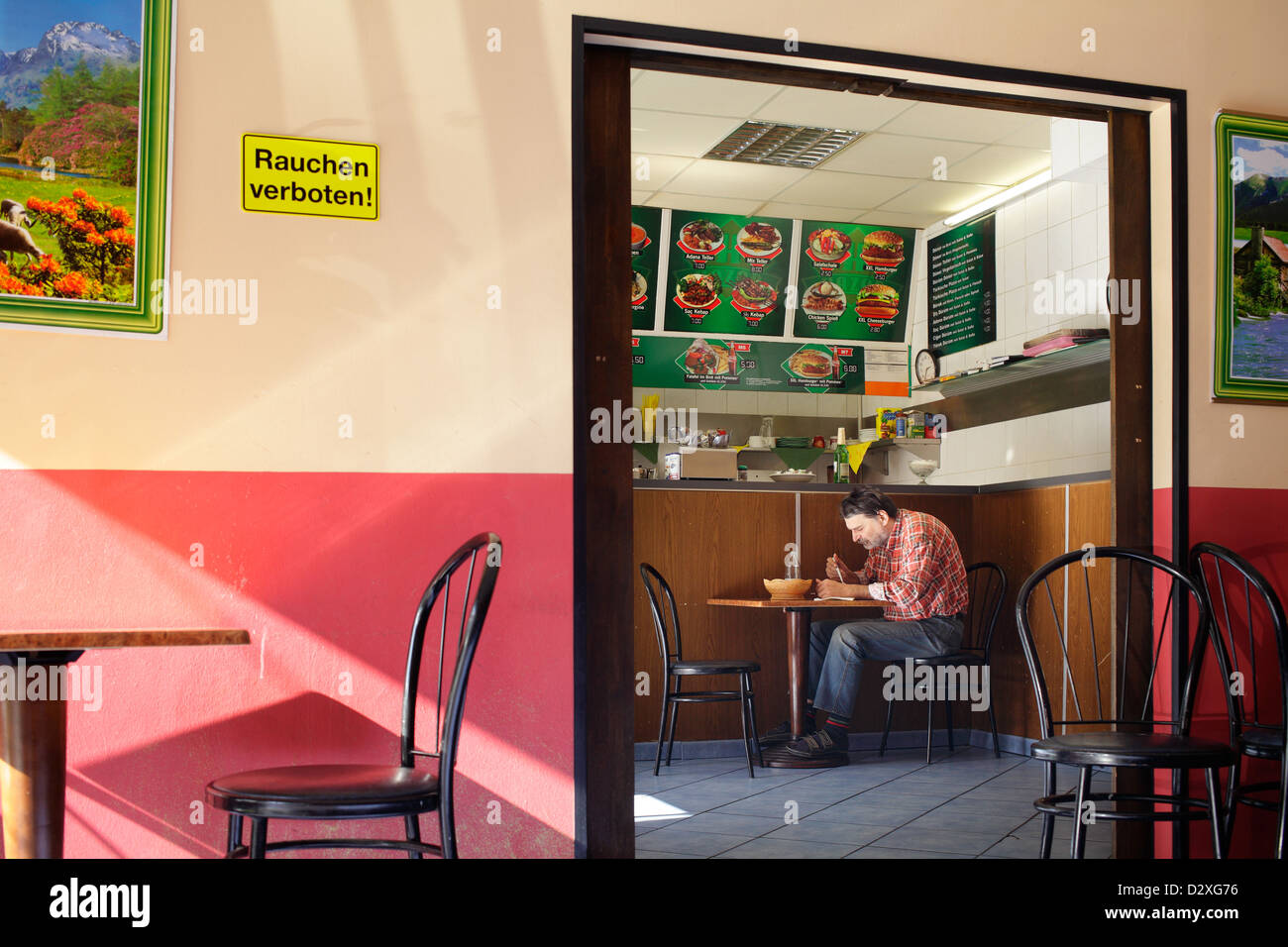 Hunched over hi-res stock photography and images - Alamy