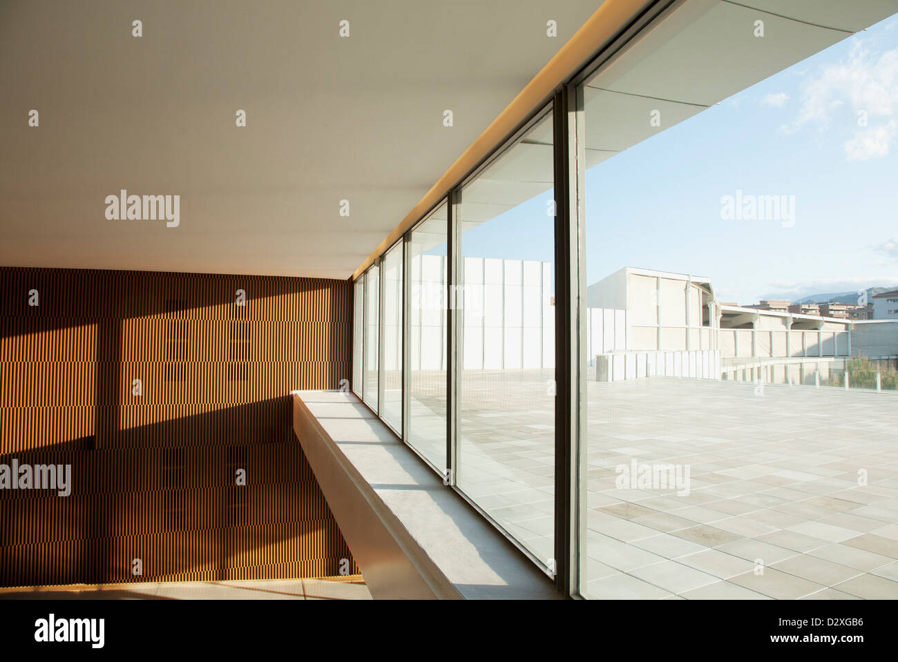 Sun shining through office window Stock Photo - Alamy