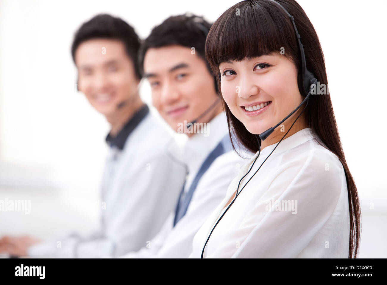 Professional customer service staff in office Stock Photo - Alamy