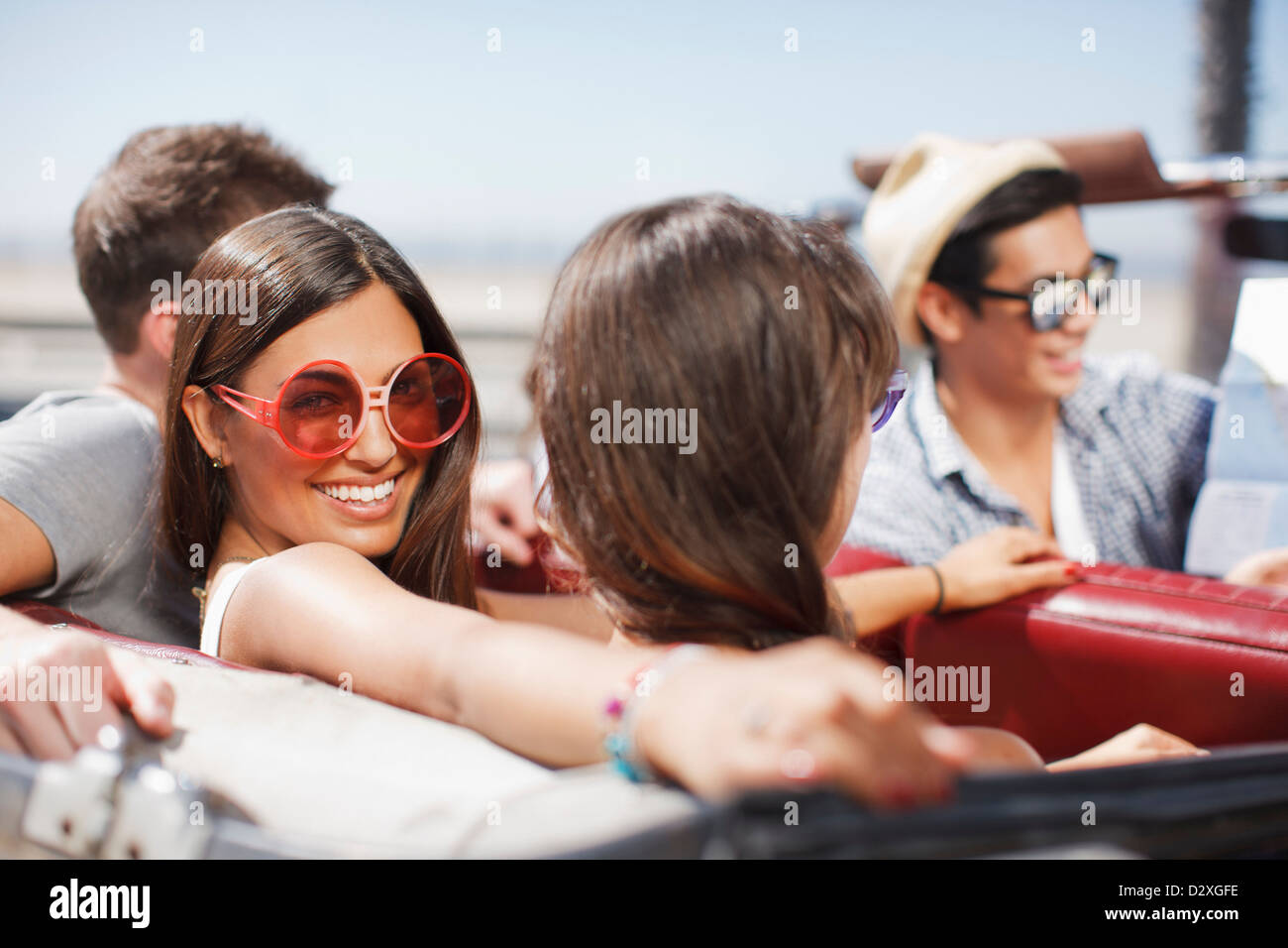 Friends driving in convertible Stock Photo - Alamy
