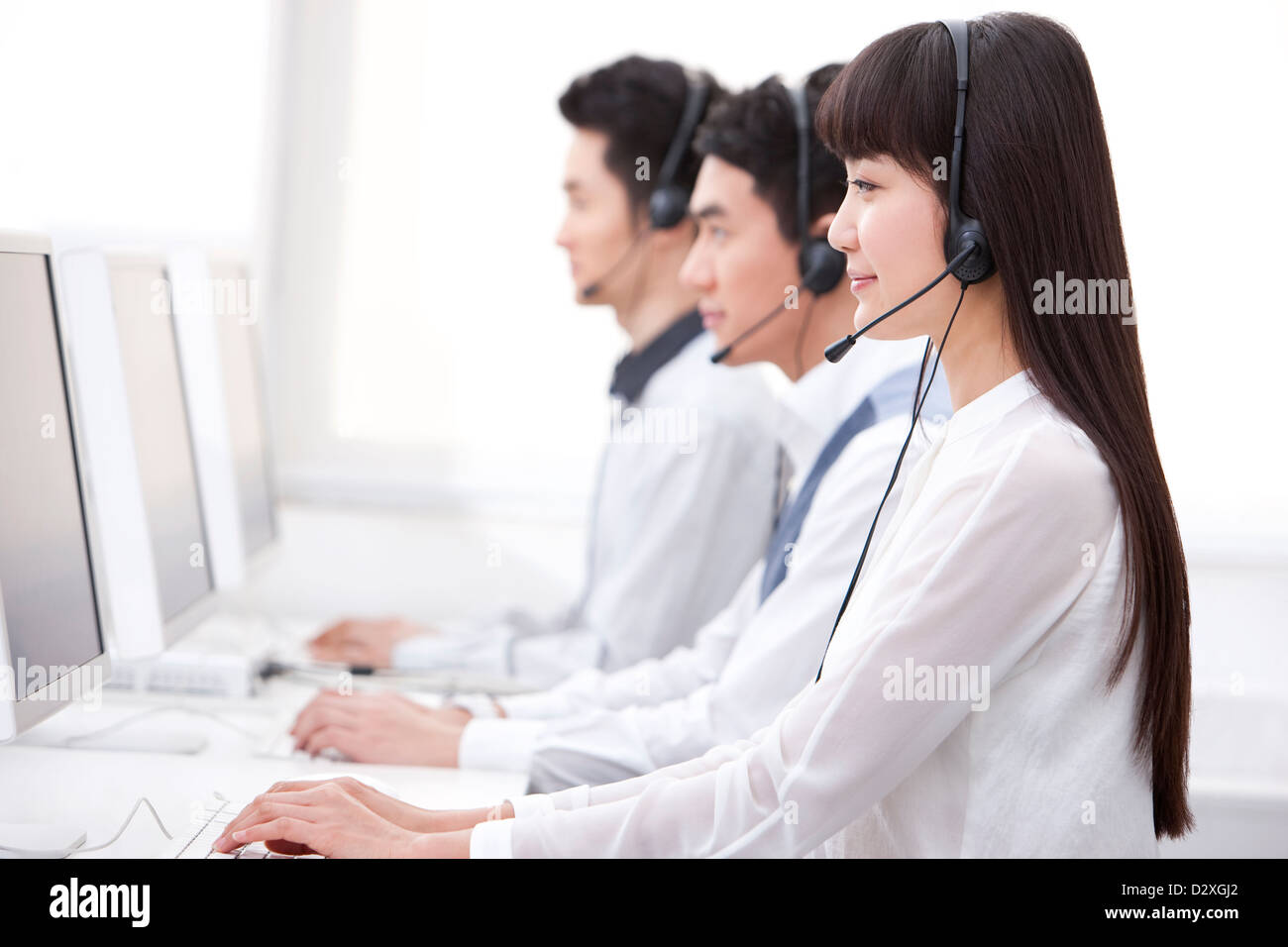Professional customer service staff in office Stock Photo - Alamy