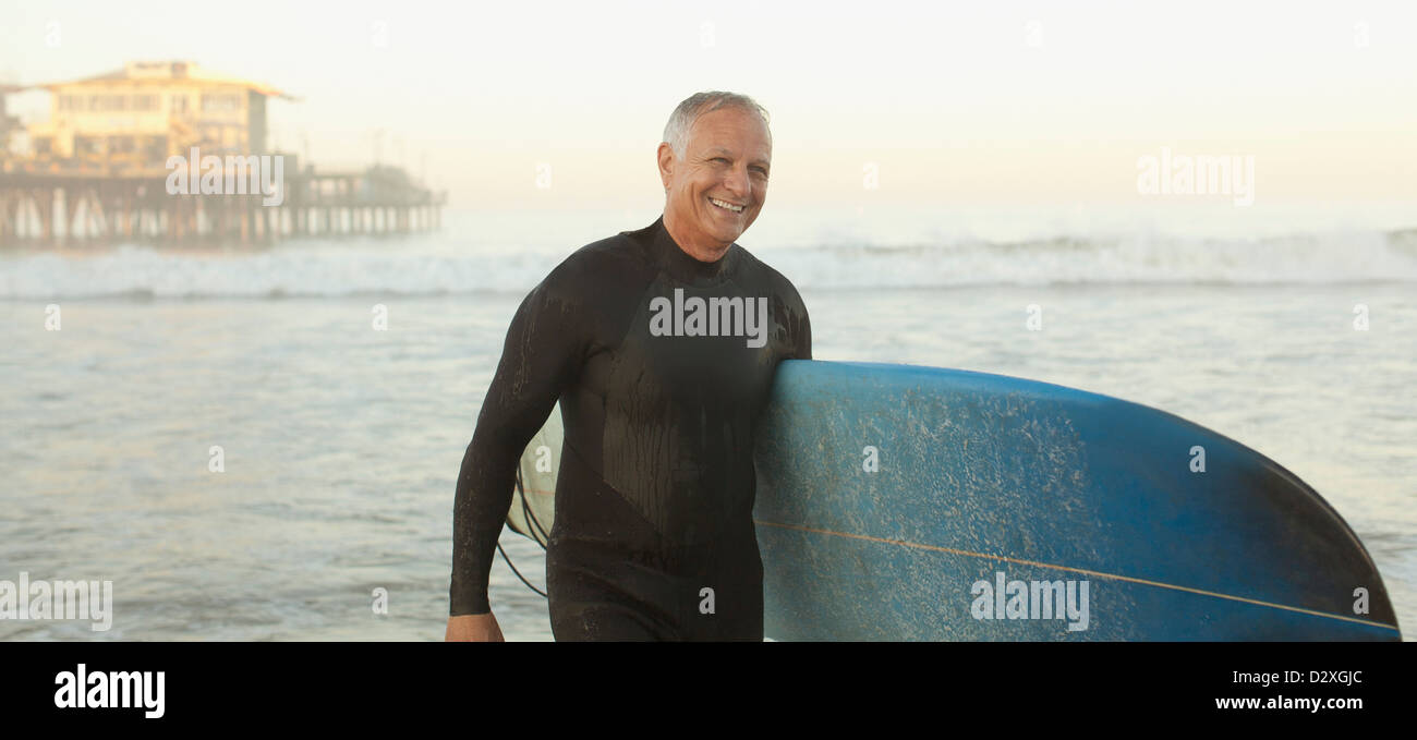 Middle aged surfer board hi-res stock photography and images - Alamy