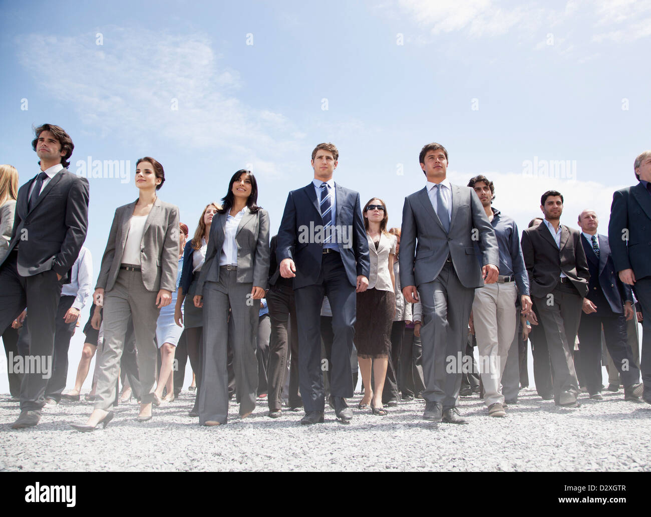 Crowd of business people walking Stock Photo - Alamy