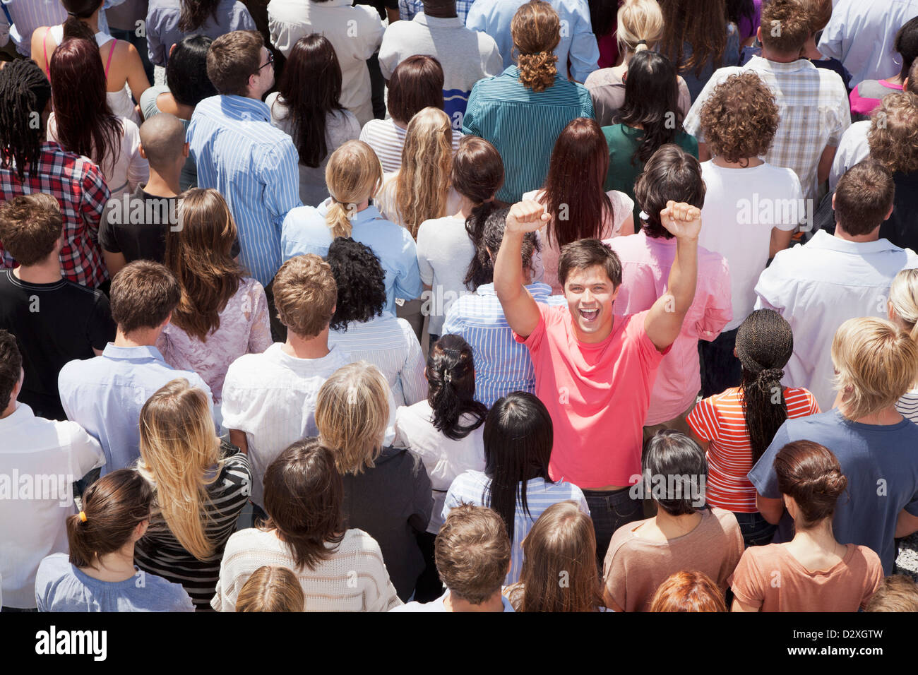 Crowd looking up cheering hi-res stock photography and images - Alamy
