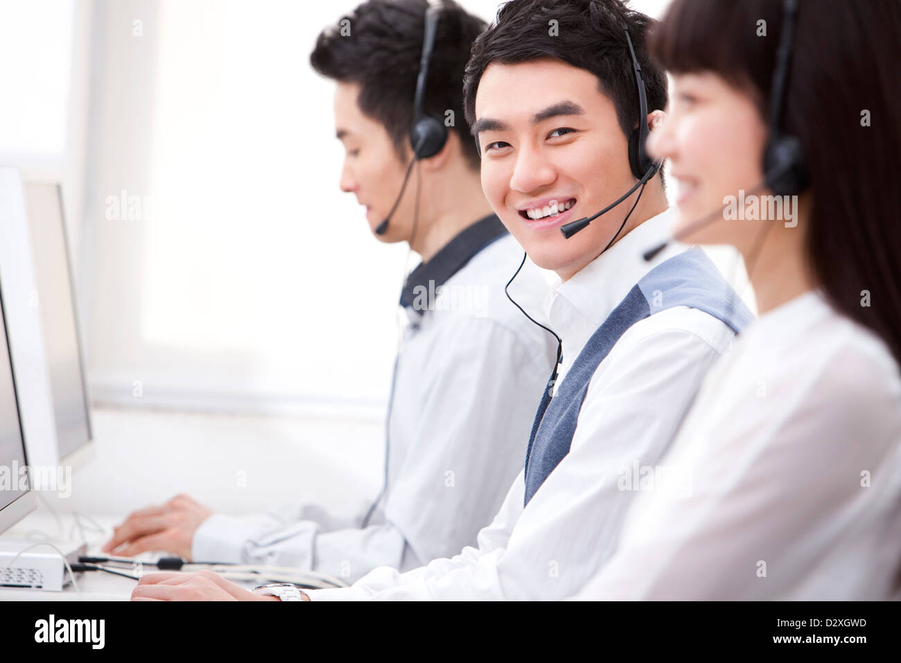 Professional customer service staff in office Stock Photo - Alamy