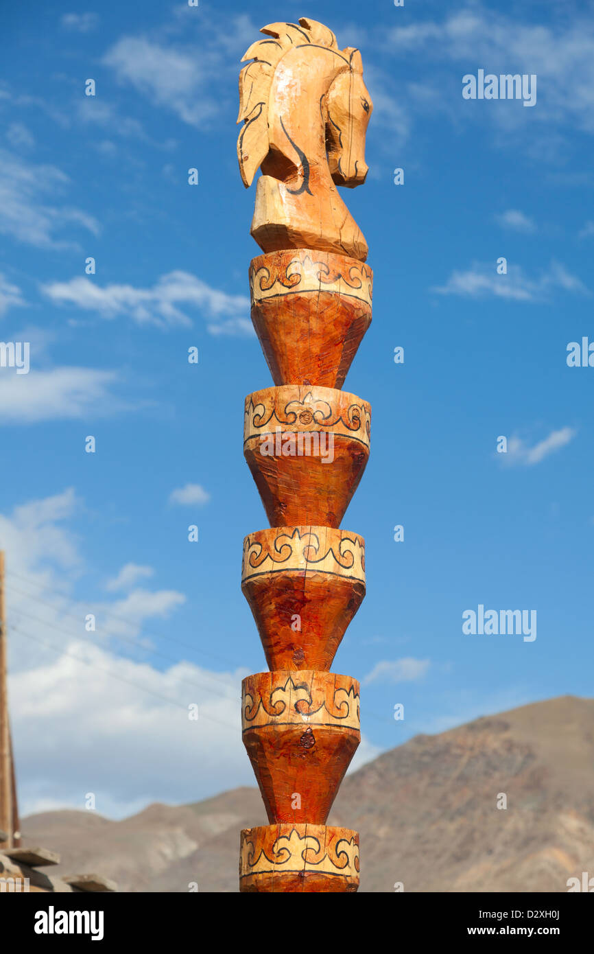 Wooden hitching post. The traditional design of the Altai Stock Photo ...