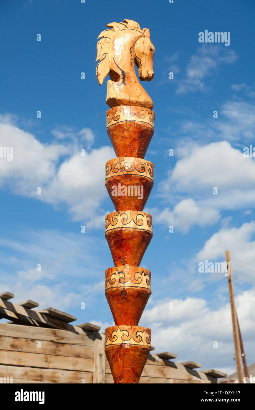 Wooden hitching post. The traditional design of the Altai Stock Photo ...