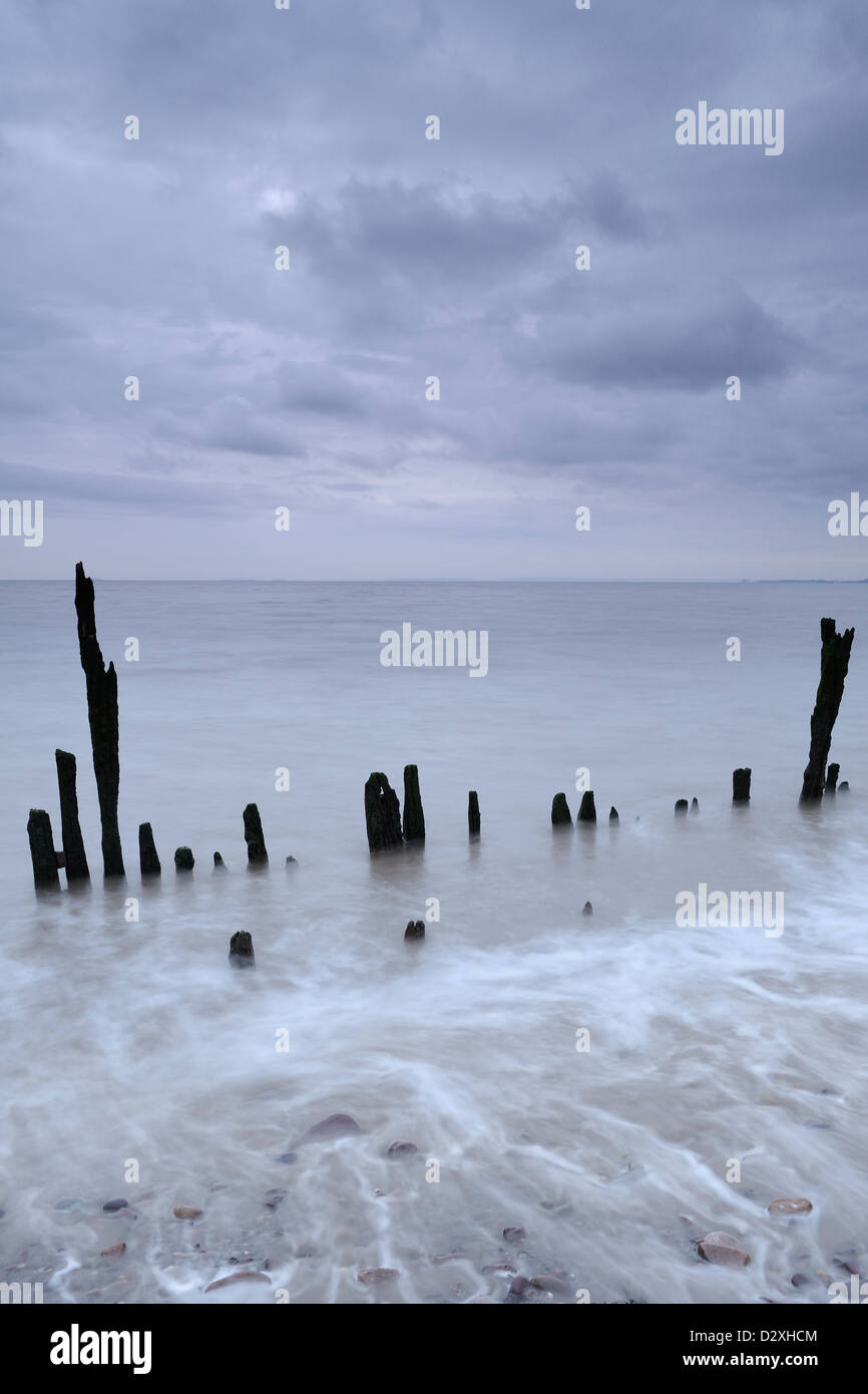Wooden groynes against a moody sky at Dunster Beach, Somerset, UK Stock ...