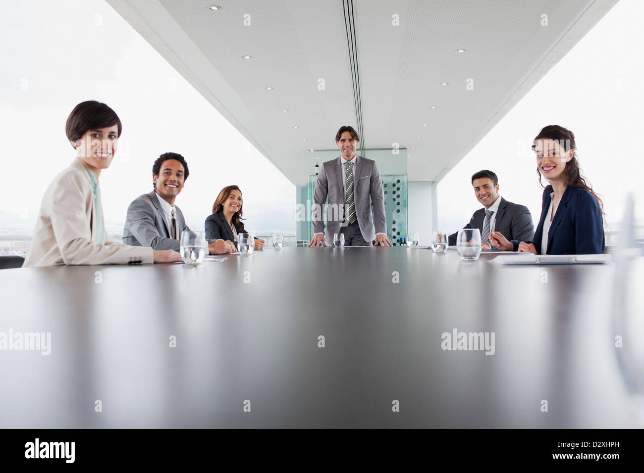 Portrait of smiling business people in conference room Stock Photo - Alamy