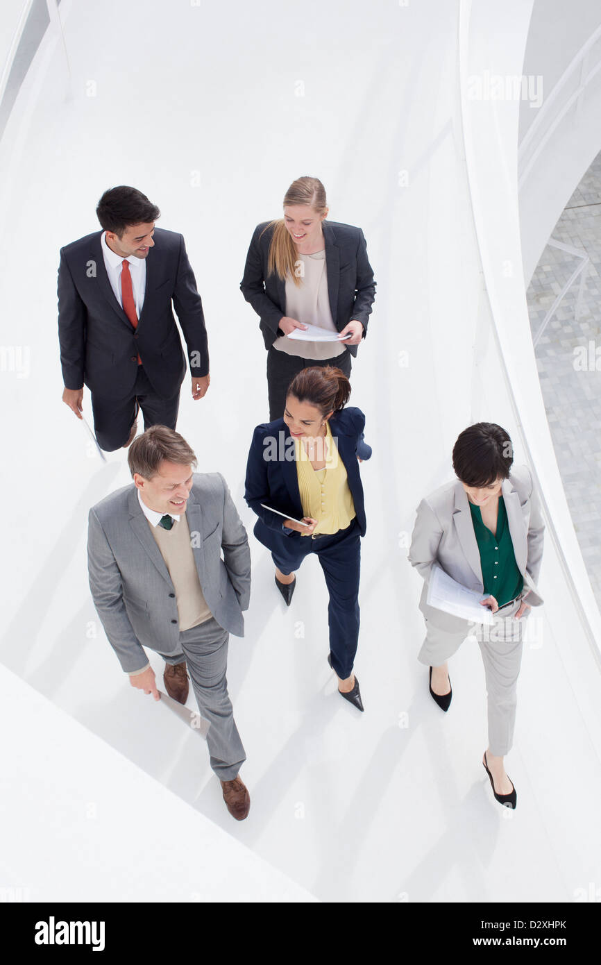 Business people walking Stock Photo - Alamy