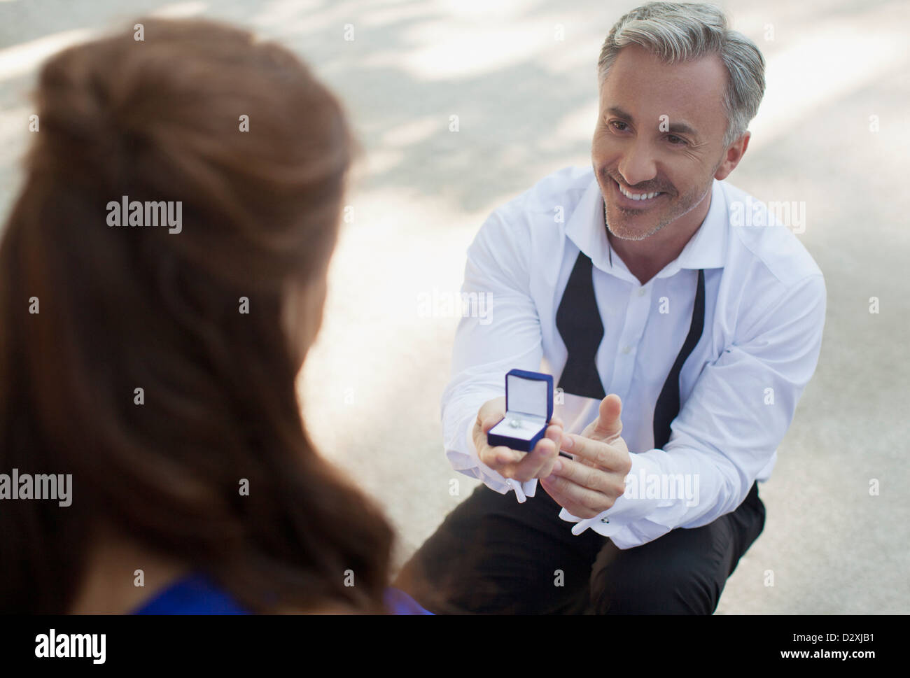 Man with engagement ring proposing to woman Stock Photo - Alamy