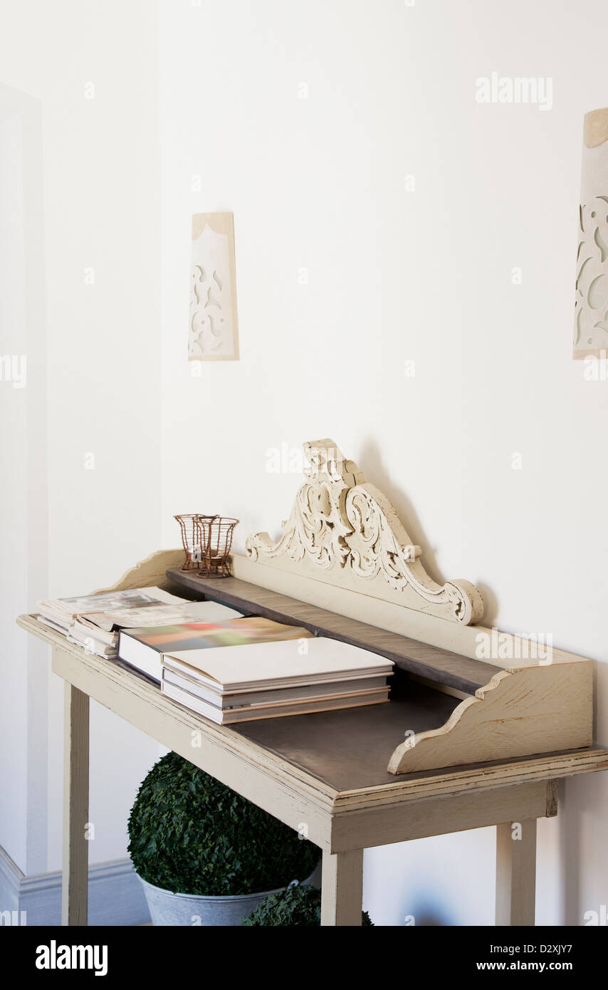 Desk with books Stock Photo - Alamy