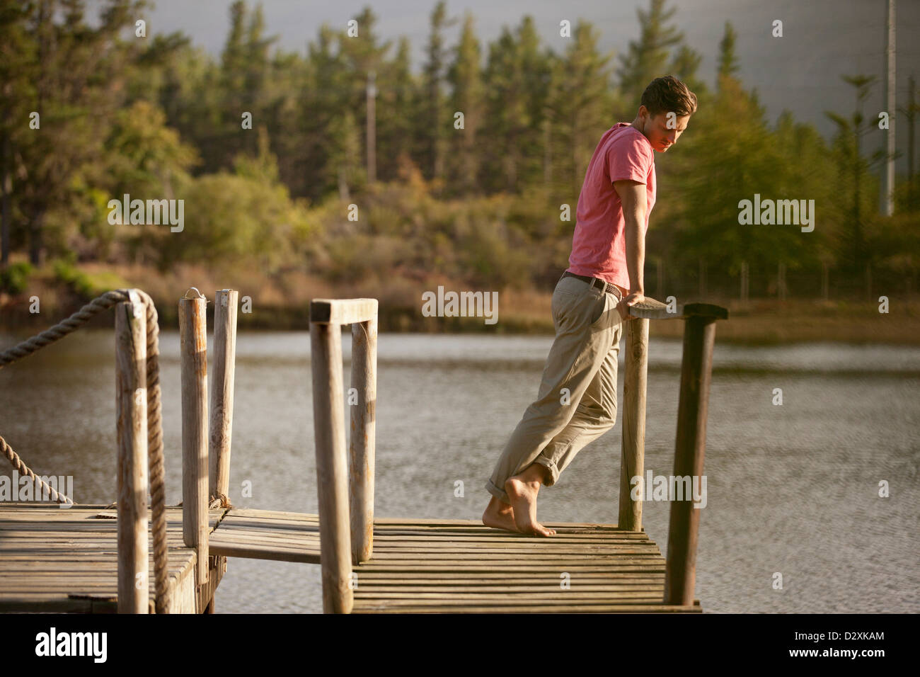 Man Leaning Over Railing High Resolution Stock Photography and Images ...