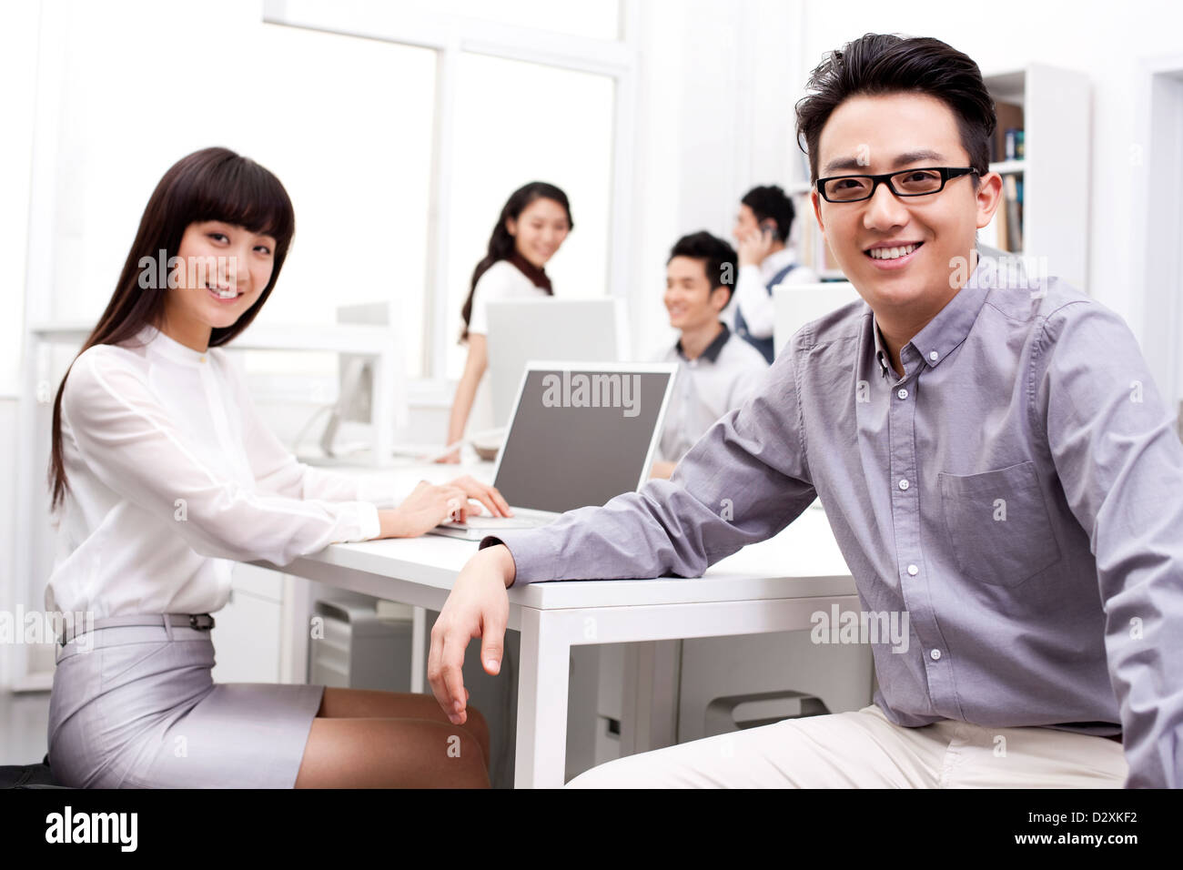 Cheerful chinese office workers hi-res stock photography and images - Alamy