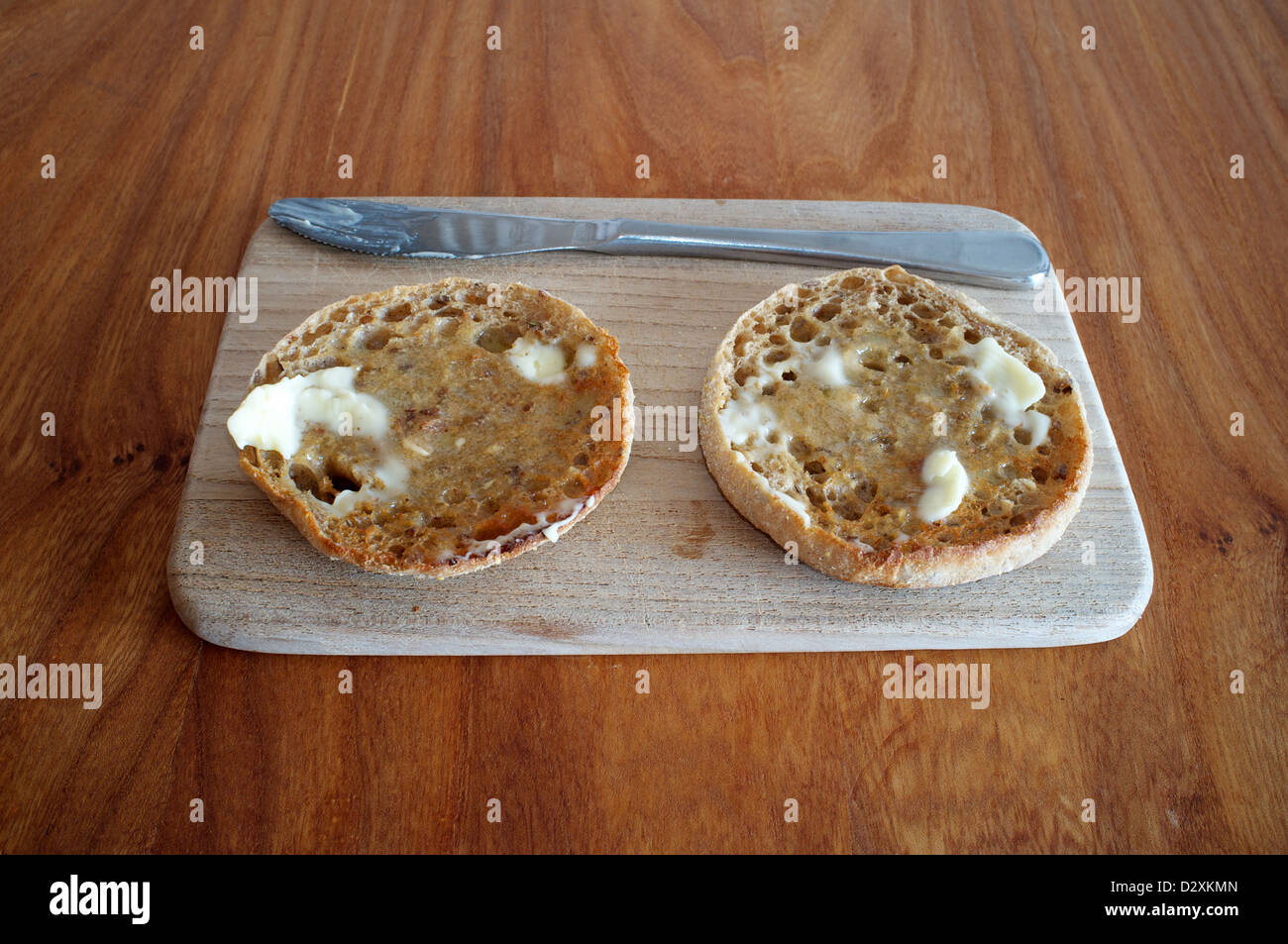 Toasted buttered muffin Stock Photo - Alamy