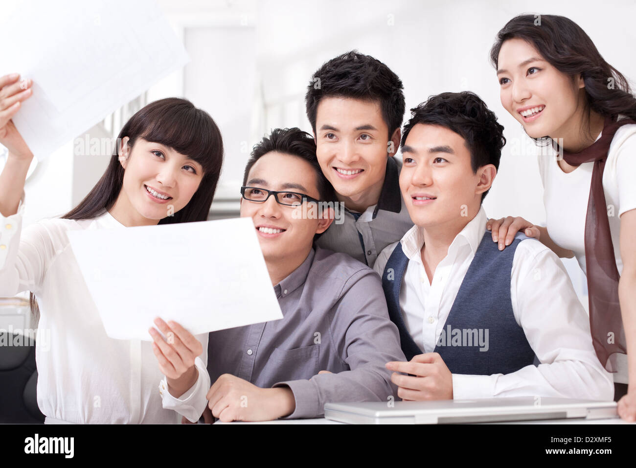 Busy office workers in meeting Stock Photo - Alamy