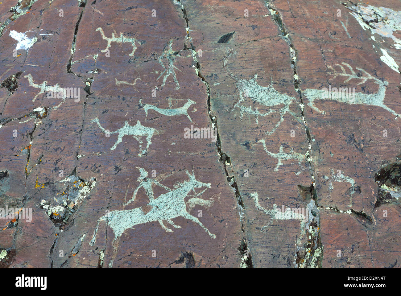The ancient drawings on rocks Stock Photo - Alamy