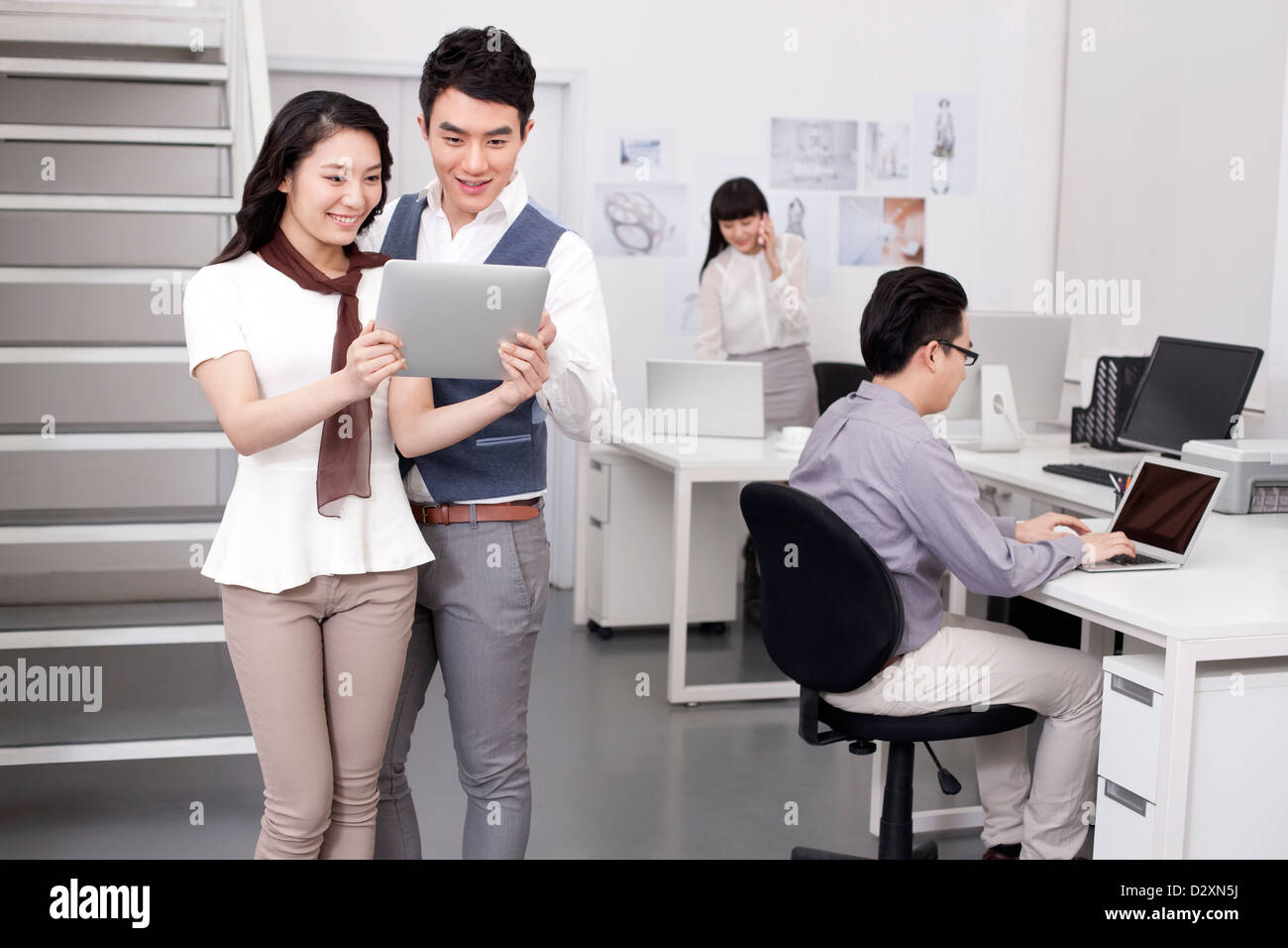 Four young office workers hi-res stock photography and images - Alamy