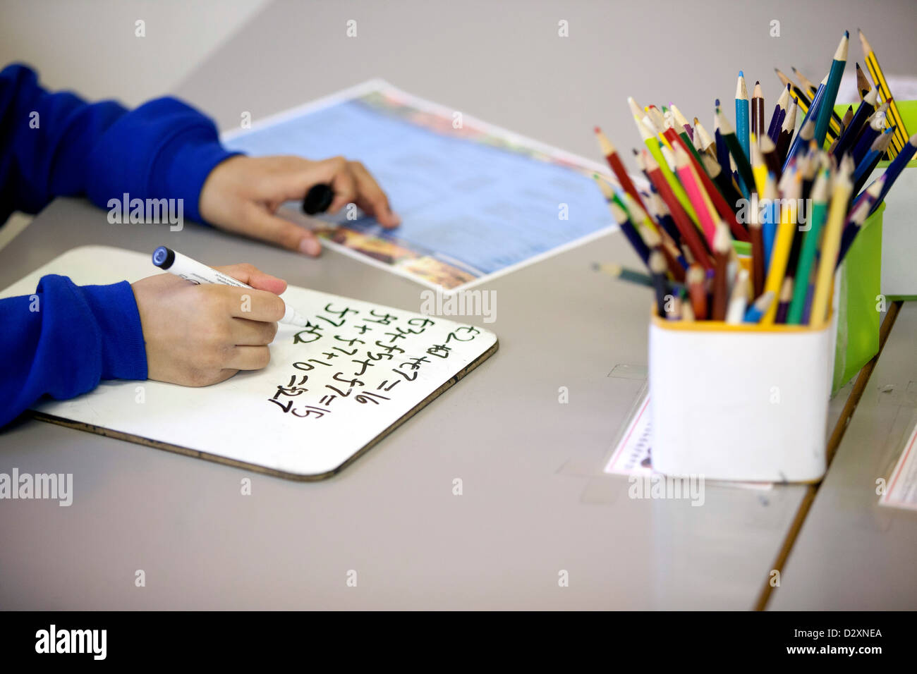 Child Writing On Whiteboard