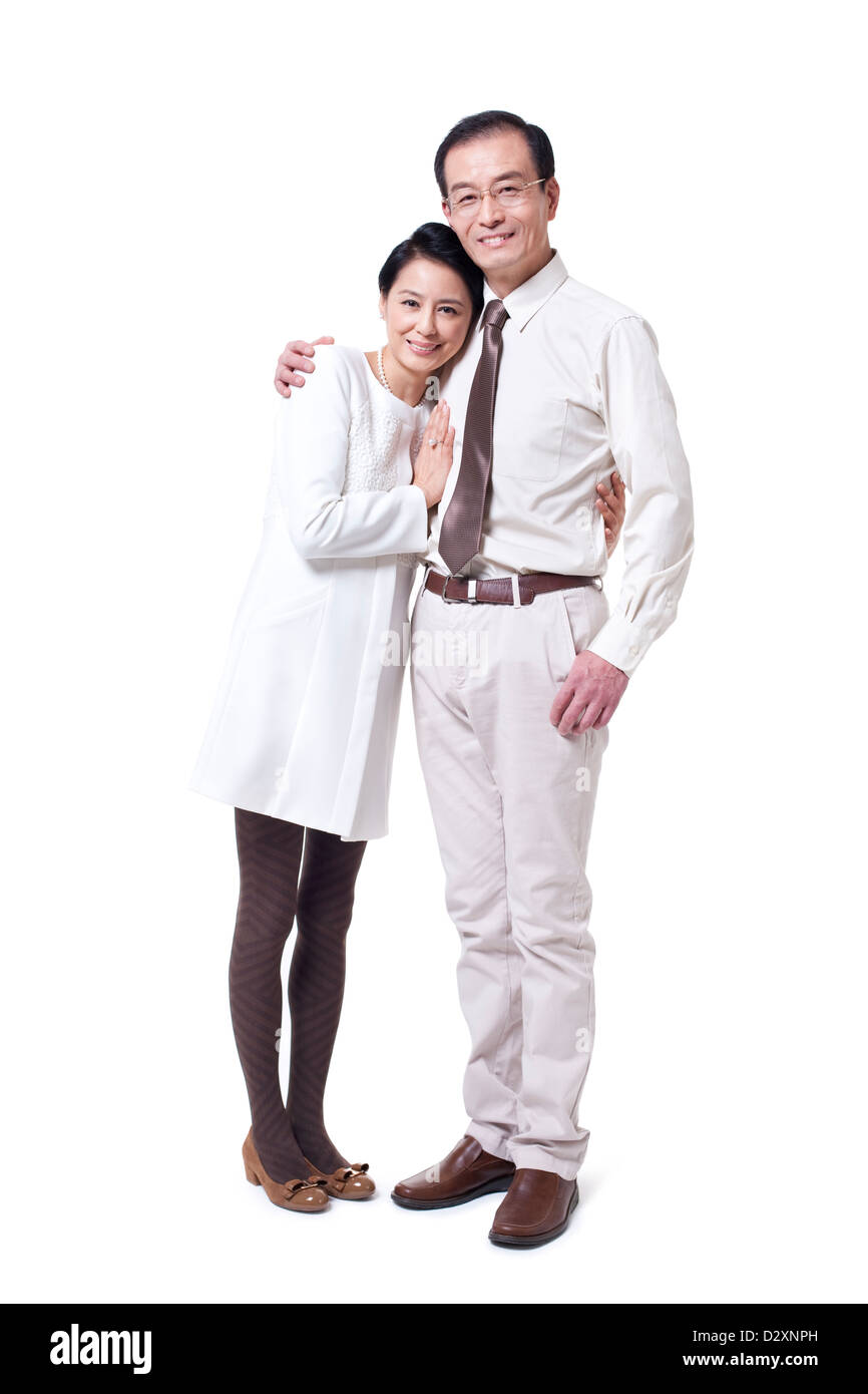 Happy mature couple arm around Stock Photo - Alamy