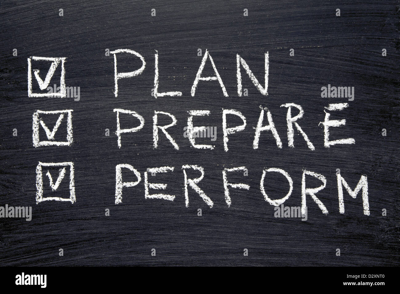 plan, prepare, perform words handwritten on chalkboard with marked ...