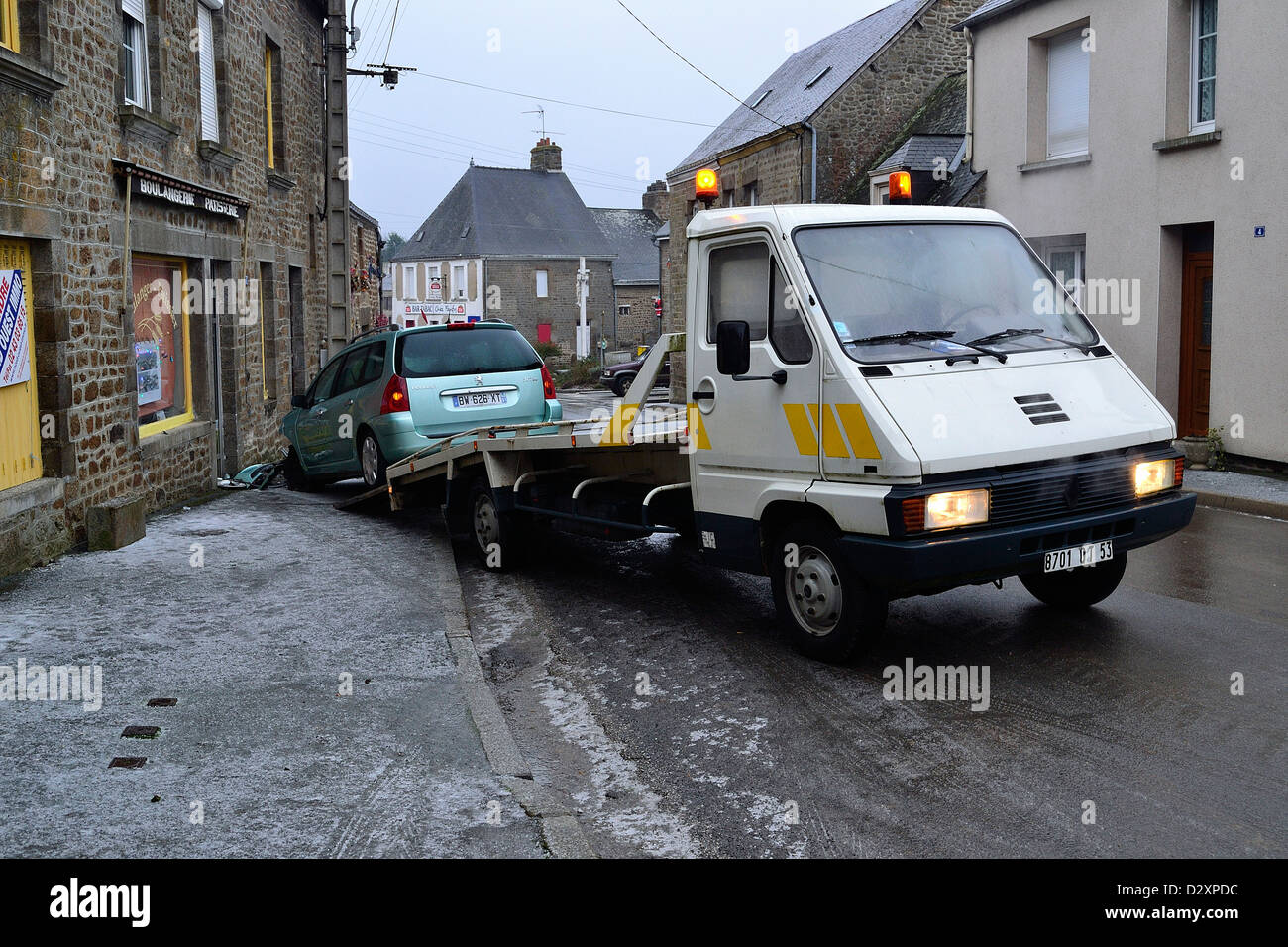 A car skidded, on the iced road and ended its running on a home, a ...