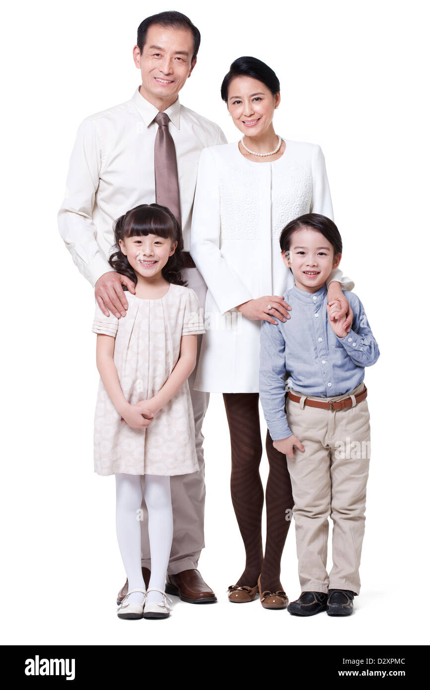 Family four standing on Cut Out Stock Images & Pictures - Alamy