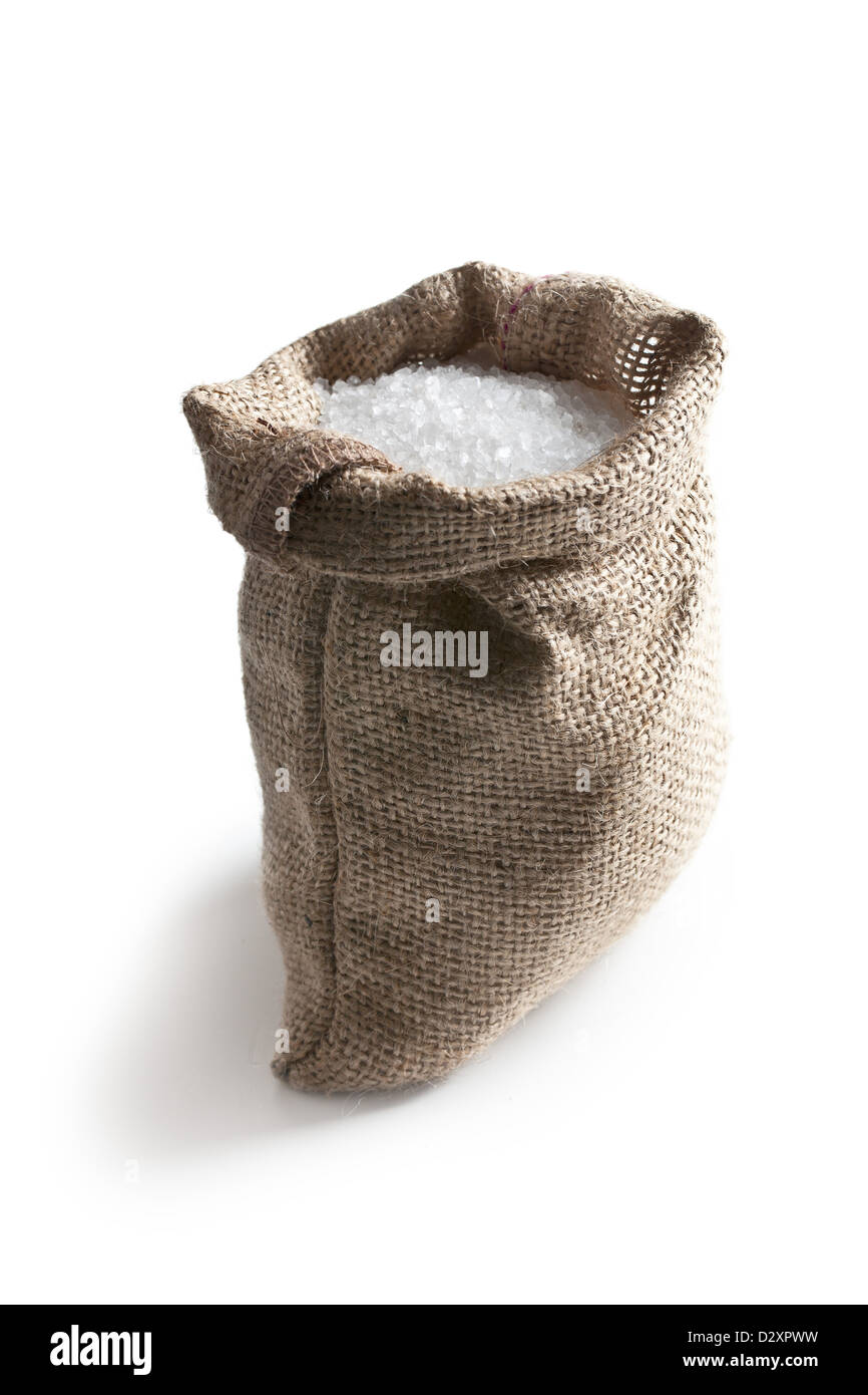 sea salt in jute sack on white background Stock Photo - Alamy