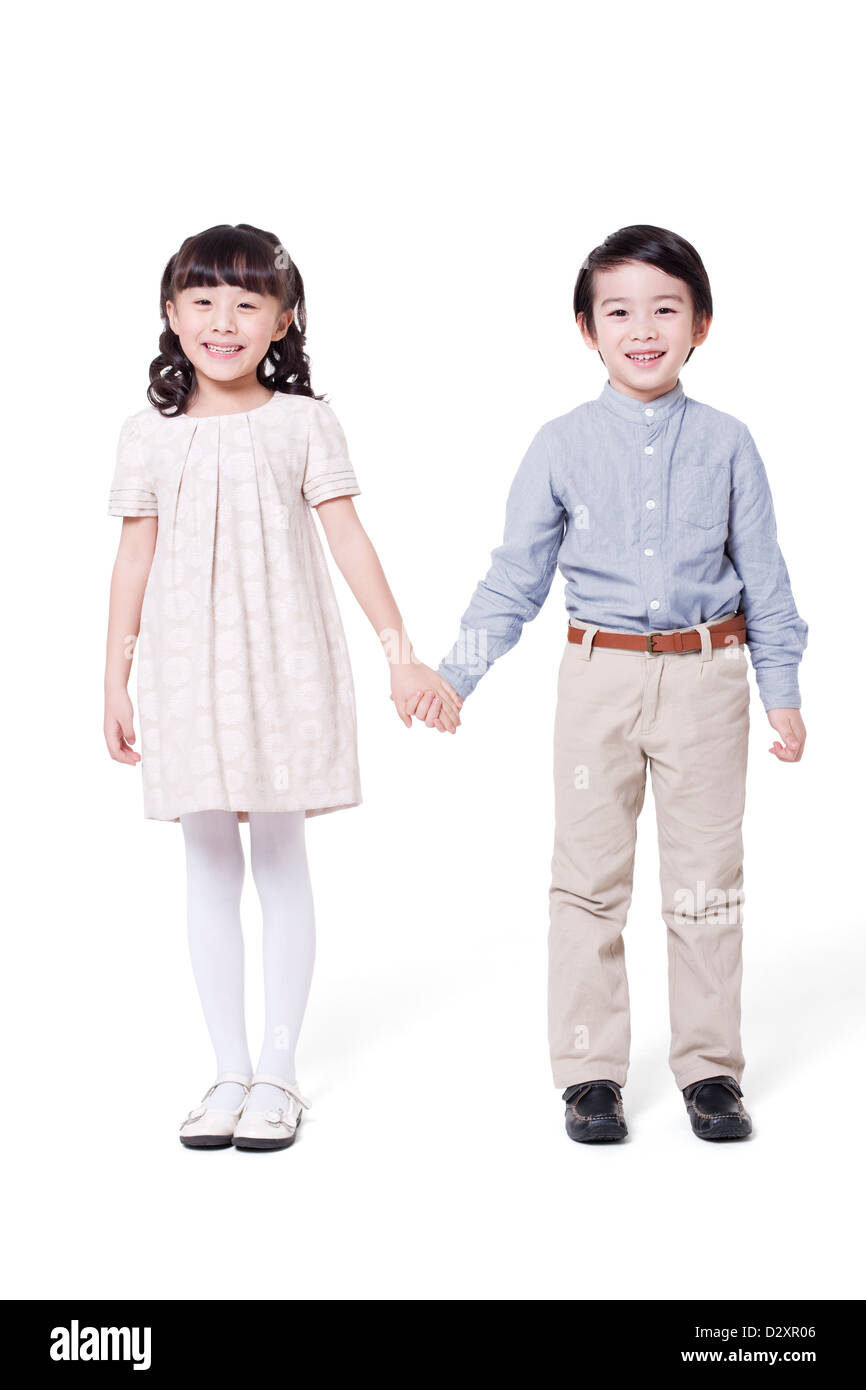 Cute boy and girl holding hands chinese hi-res stock photography and ...