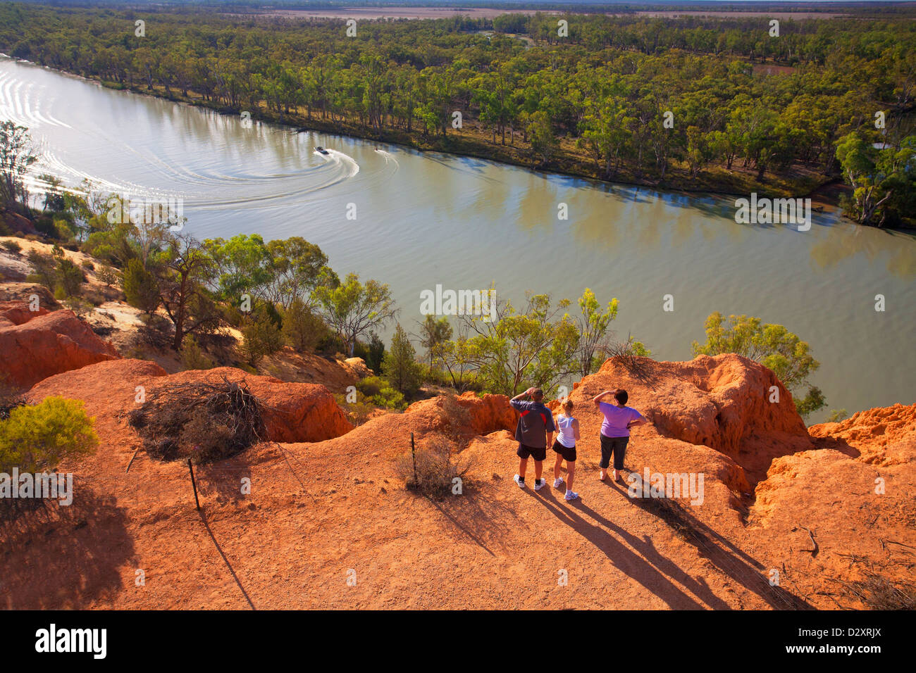 A family looking at the view from the Heading Cliff lookout in the ...