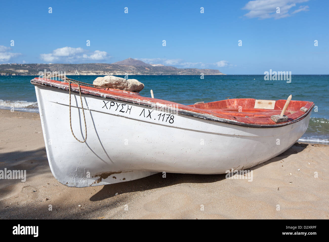 white Greek Rowing fishing Boat Chrissie on the sandy beach, Crete and ...