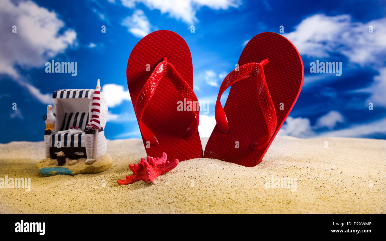 Sand beach and flip flops Stock Photo - Alamy