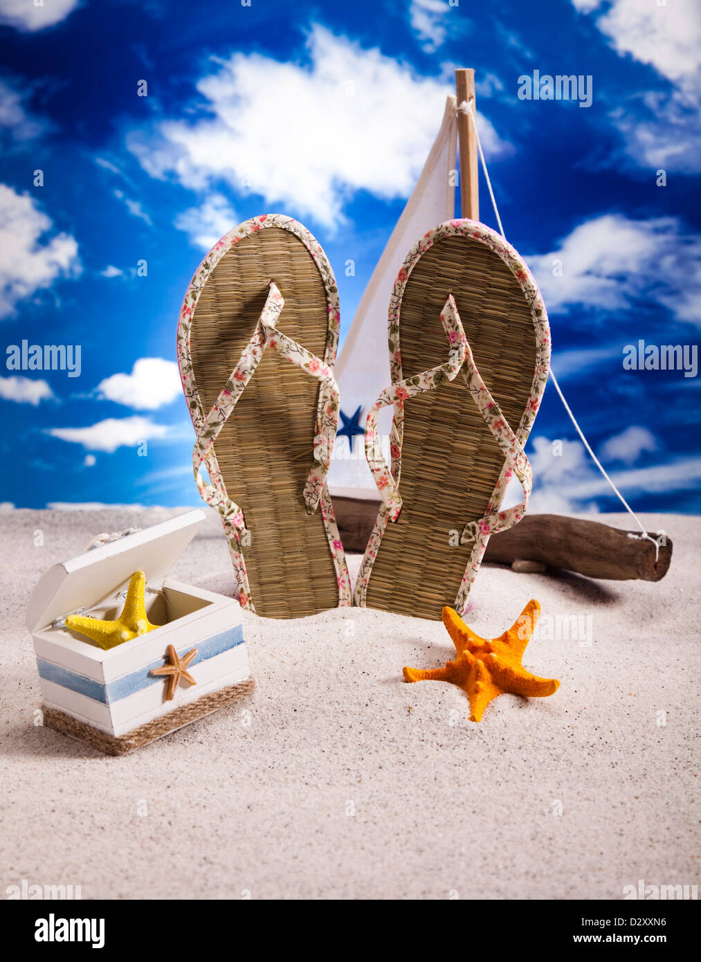 Flip flops and sand Stock Photo - Alamy