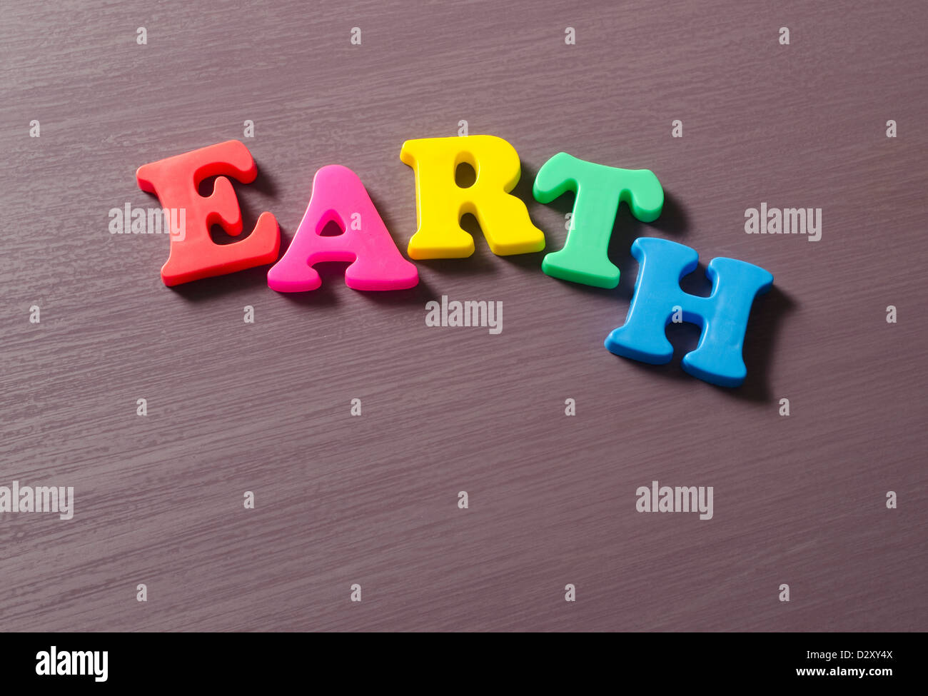 EARTH spelled out in childrens letters Stock Photo - Alamy