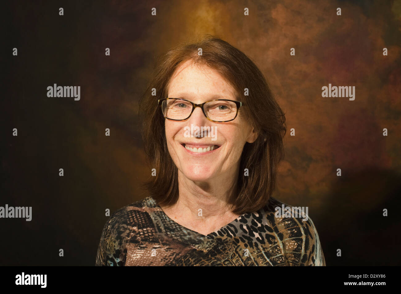 portrait of mature smiling redhead woman Stock Photo - Alamy