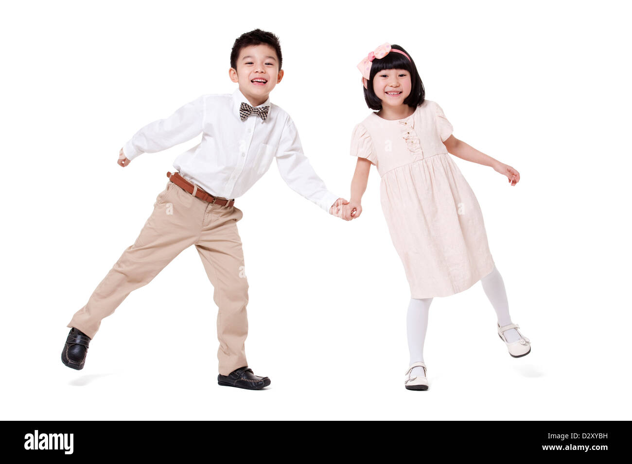 Lovely boy and holding hands having fun Stock Photo - Alamy