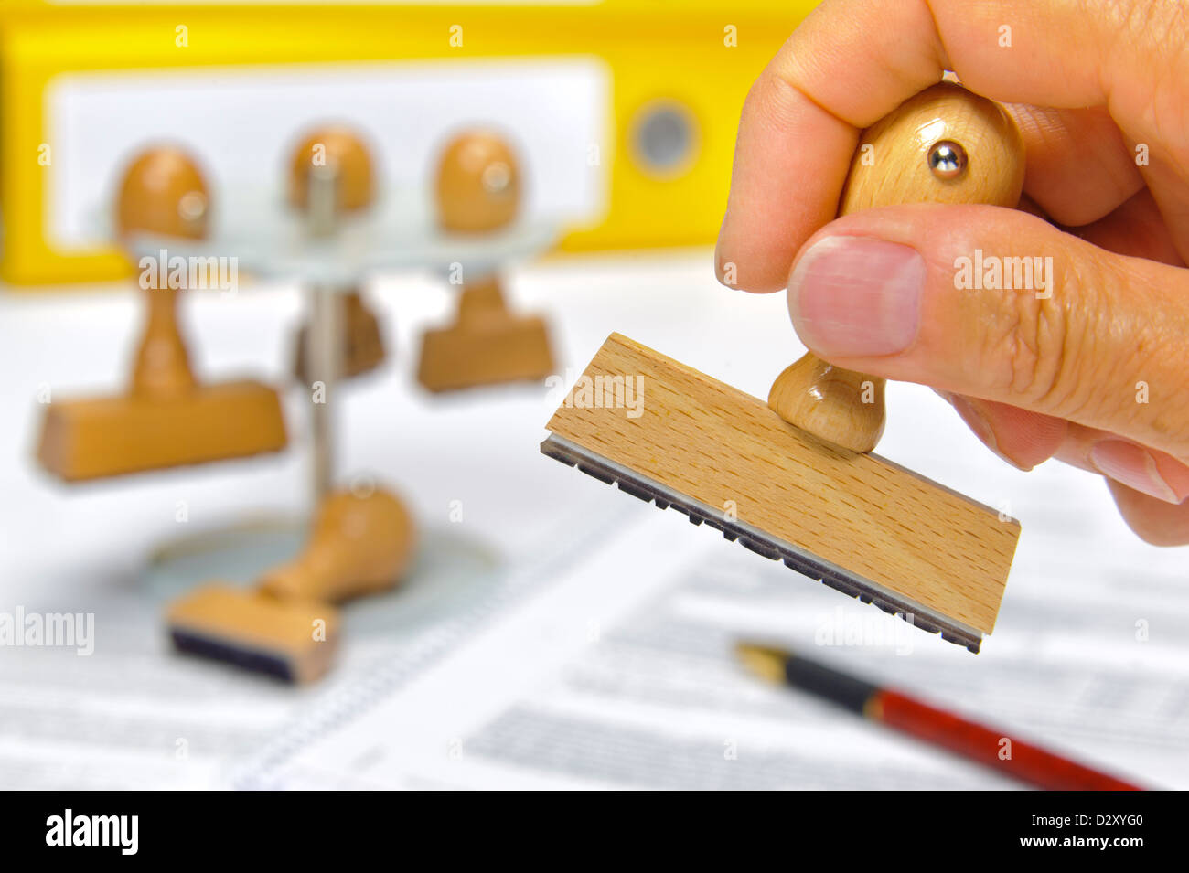 blank rubber stamp in hand for your individual text Stock Photo - Alamy
