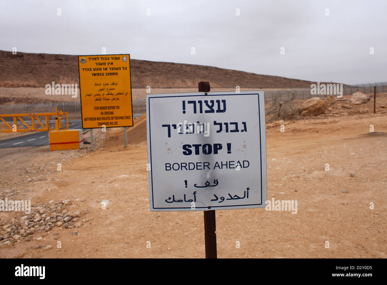 Border warning signs displayed at the desolate Road 10 stretching ...