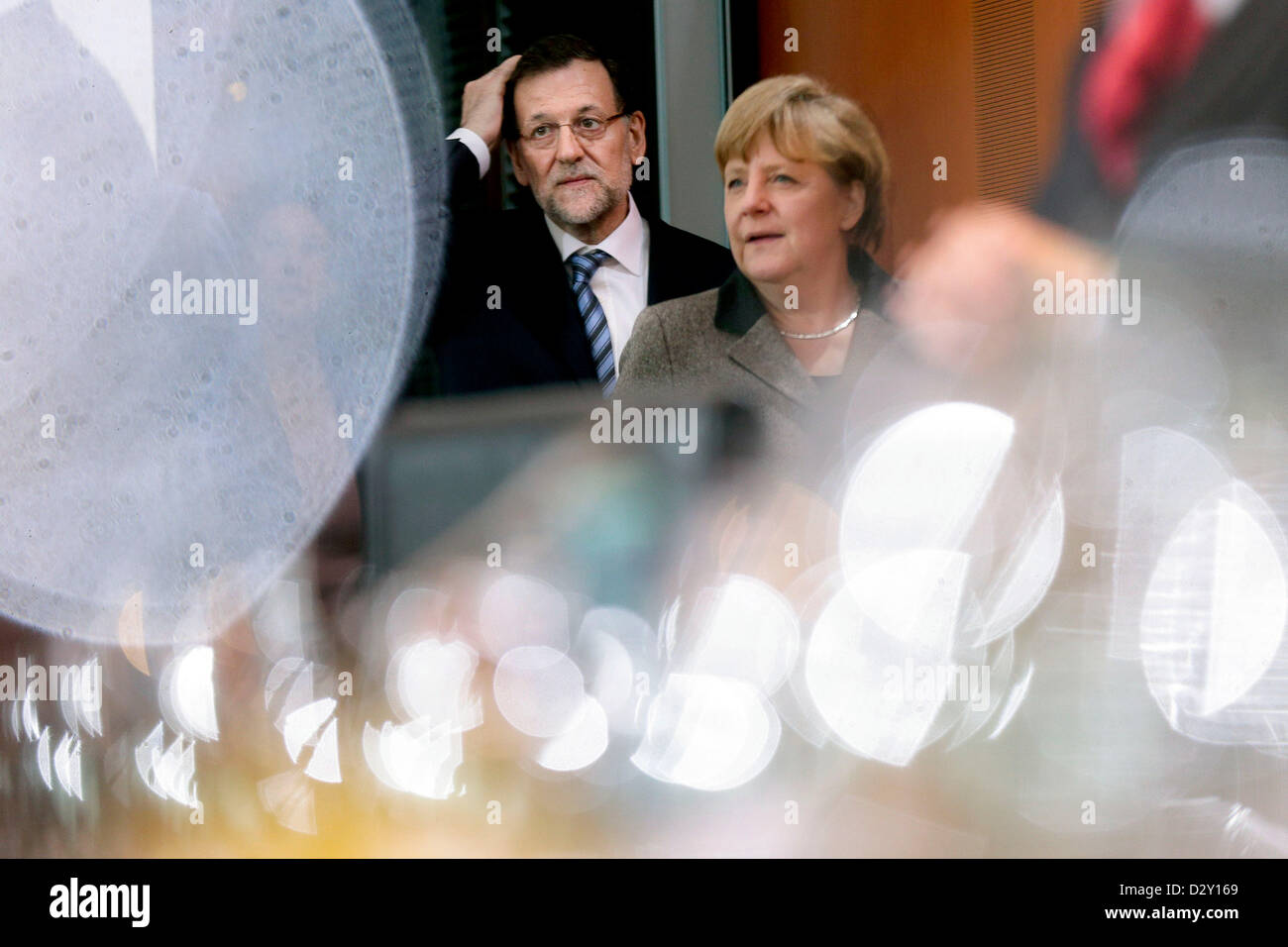 German Chancellor Angela Merkel, right, and Spanish Prime Minister ...