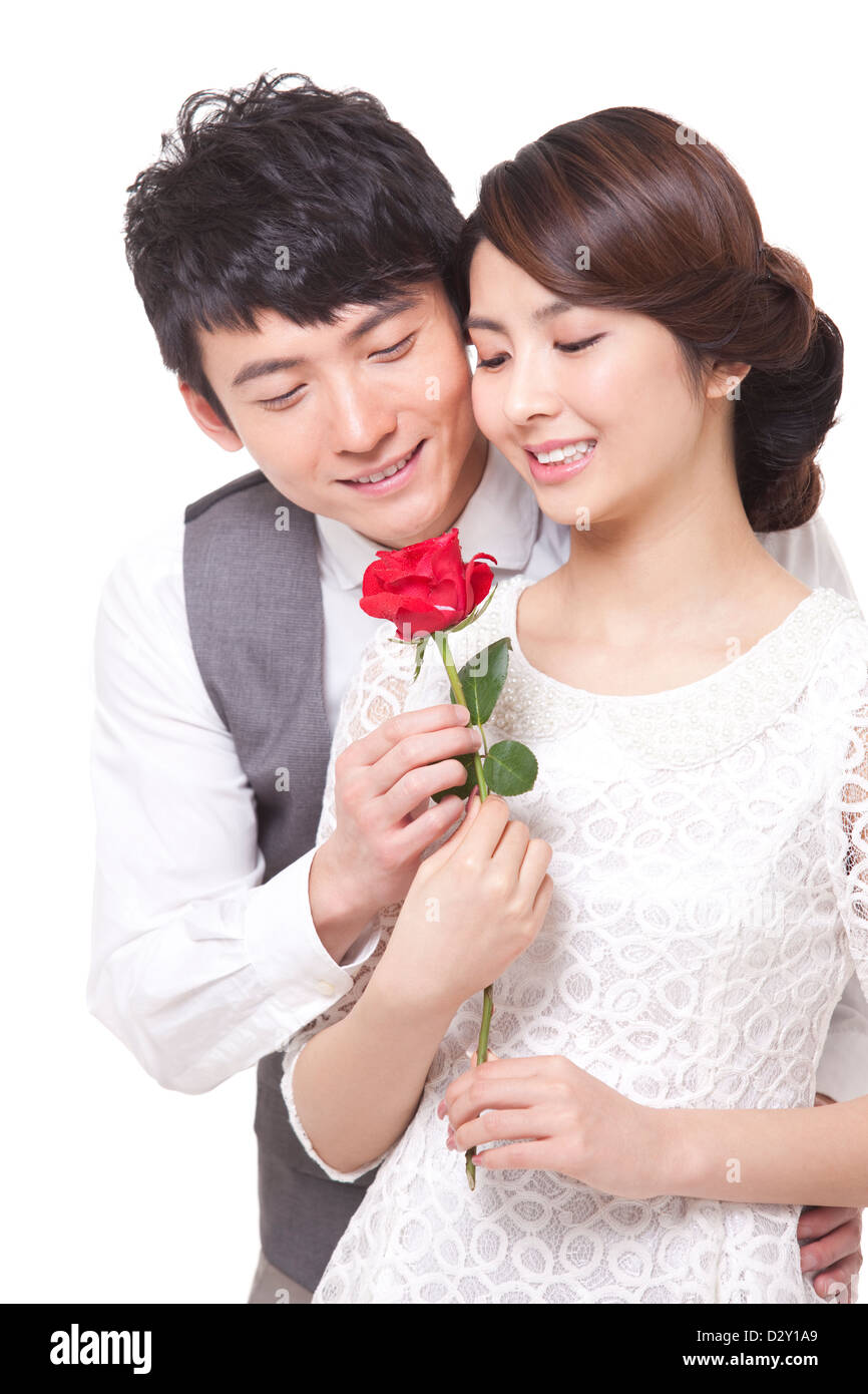 Young couple giving rose hi-res stock photography and images - Alamy