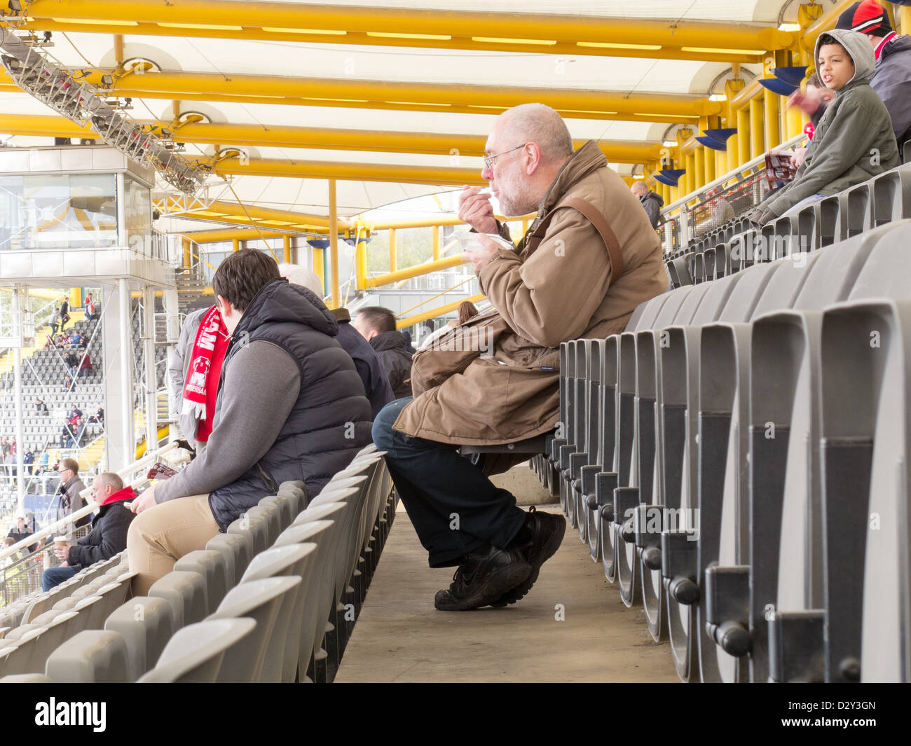 Football fan eating pie hi-res stock photography and images - Alamy