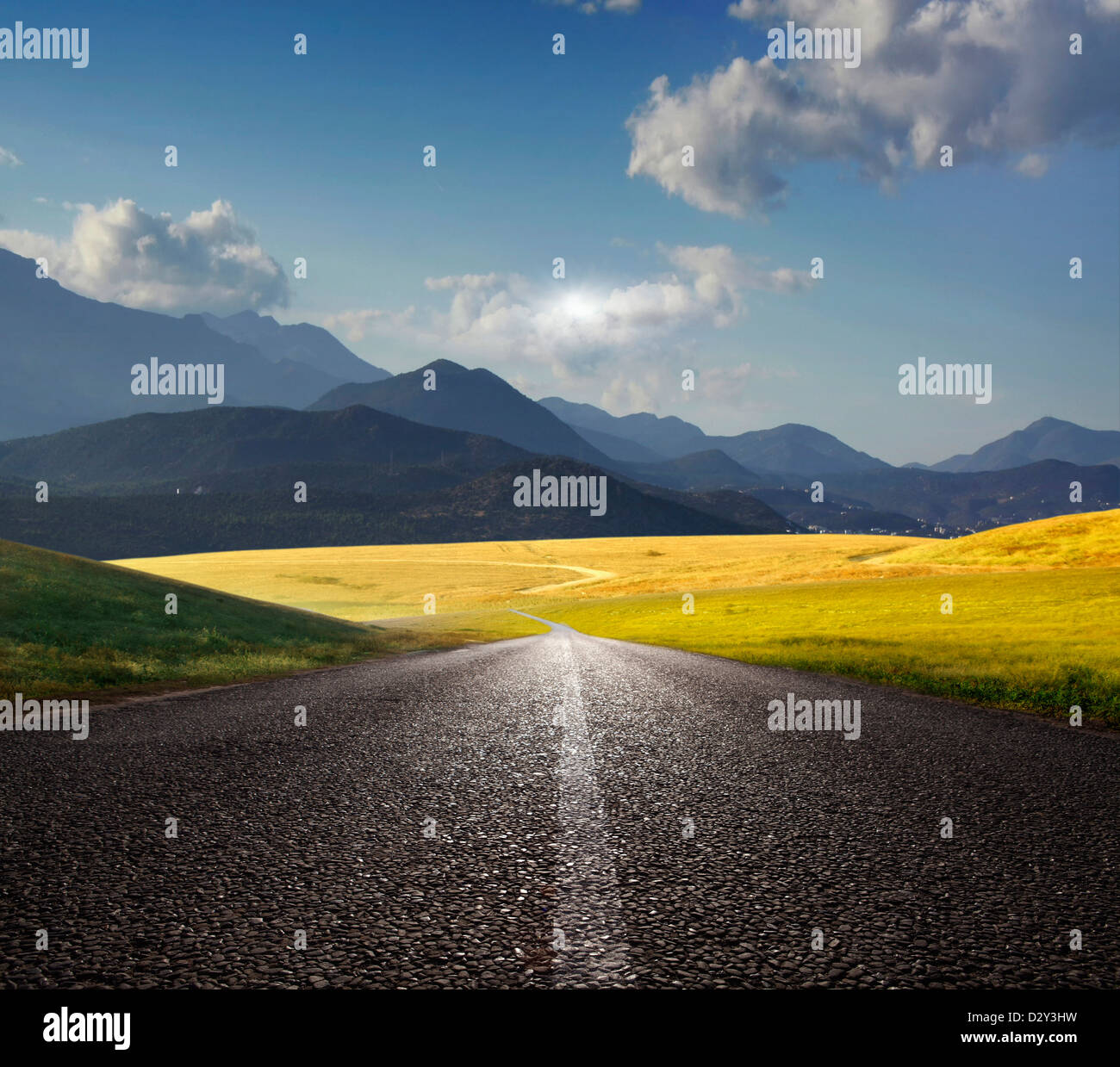 Country road in the valley Stock Photo - Alamy