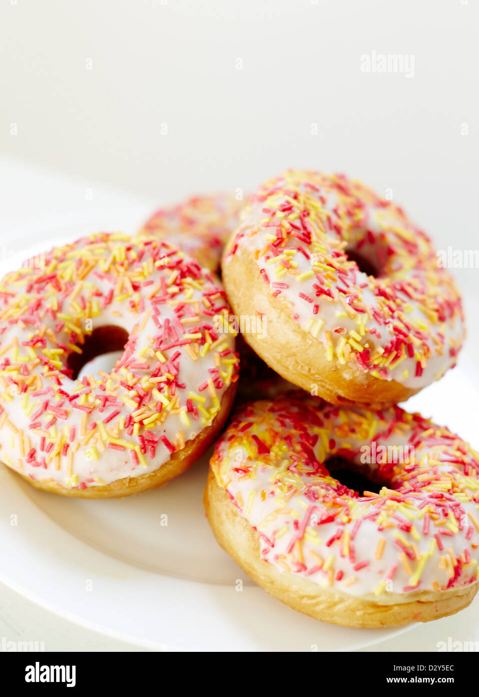 Doughnuts on a plate Stock Photo - Alamy