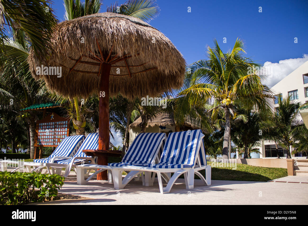 A perfect spot to relax by the pool Stock Photo - Alamy